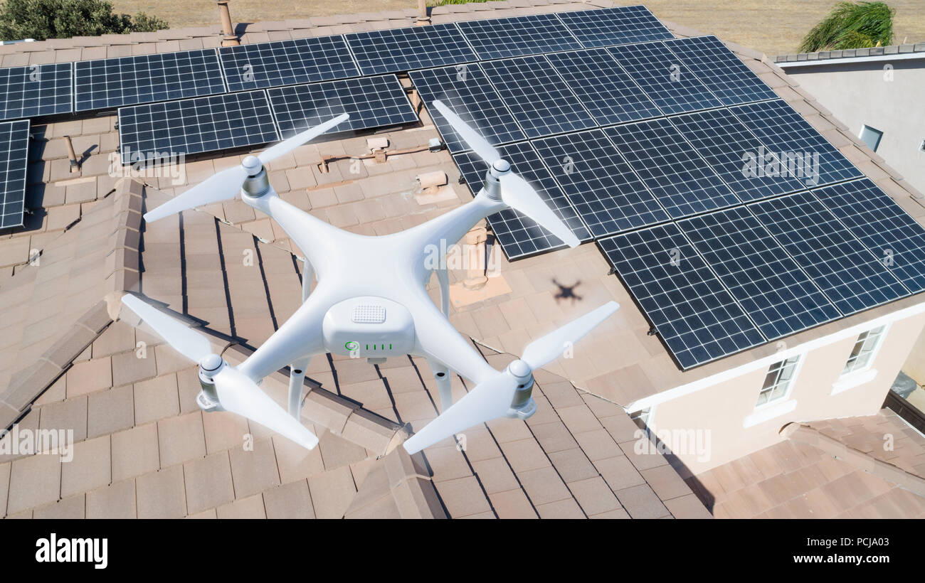 UAV Drone Inspecting Solar Panels On Large House Stock Photo - Alamy