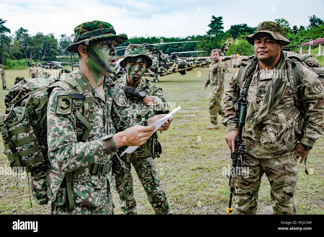 U.S. Army soldiers with Charlie Company, 100th Battalion, 442nd Infantry Regiment, U.S. Army ...