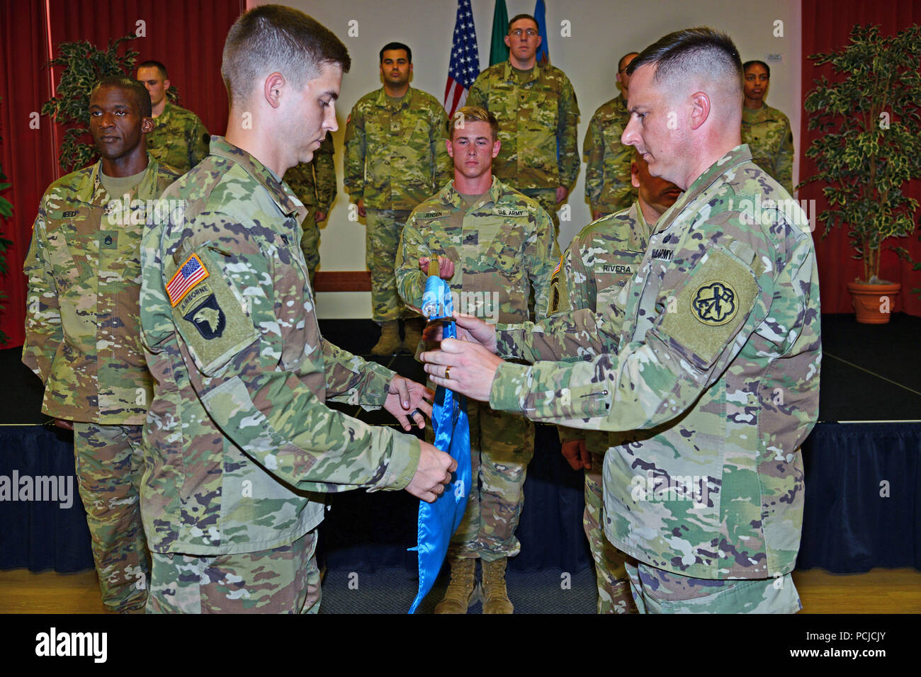 U.S. Army Lt. Col. Jared A. Hoffman (right), commander of 522nd ...