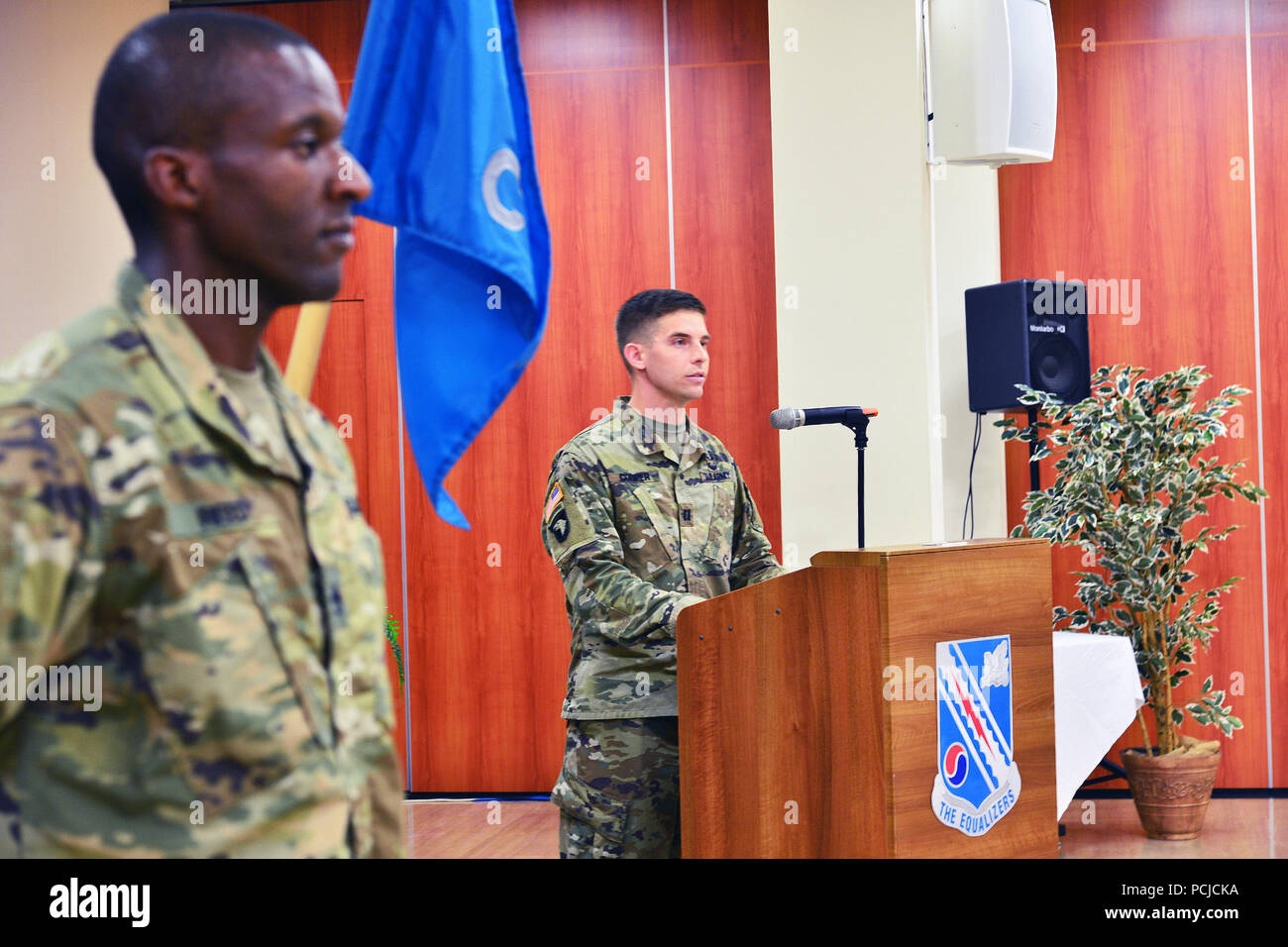 U.S. Army Capt. Jesse R. Cooper, incoming commander, gives a speech ...