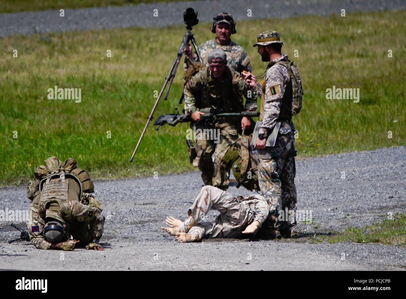 A British sniper team run with simulated causality to finish the stress ...