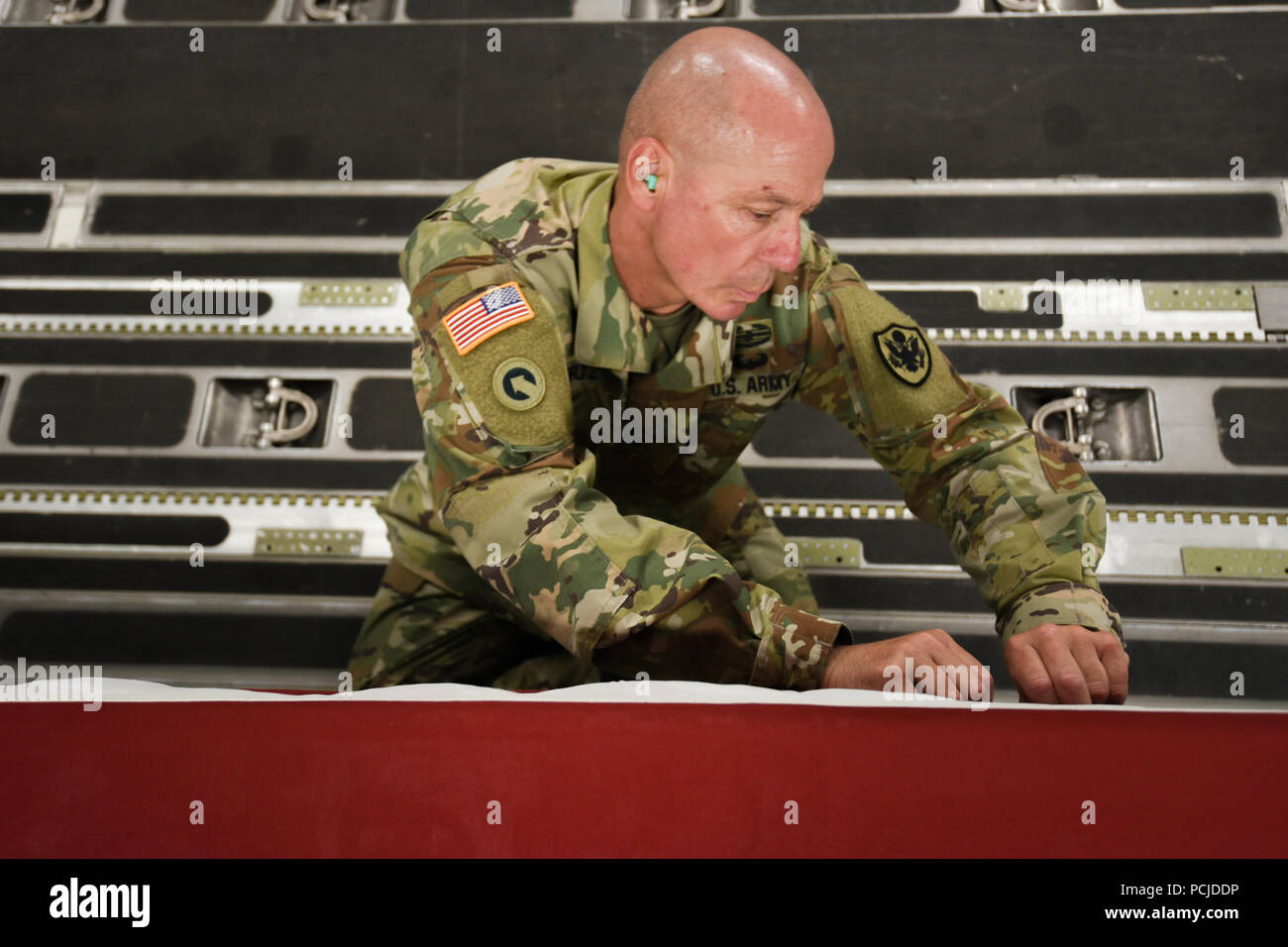 U.S. Army Sgt. 1st Class Eric Feltz, mortuary affairs specialist ...