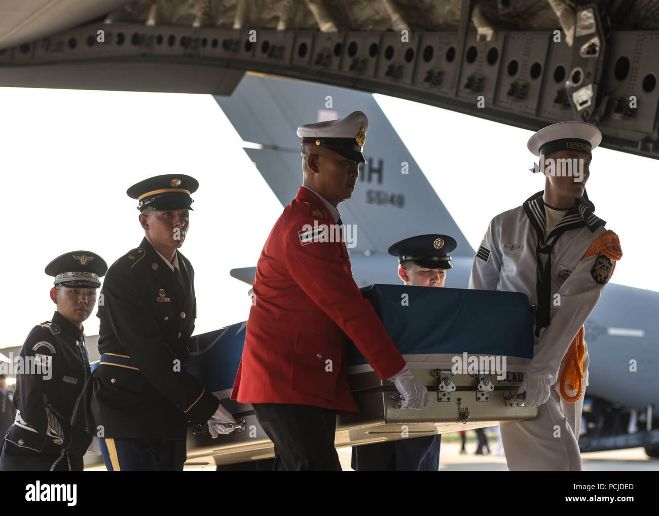 Members of the United Nations Command Honor Guard place a dignified ...