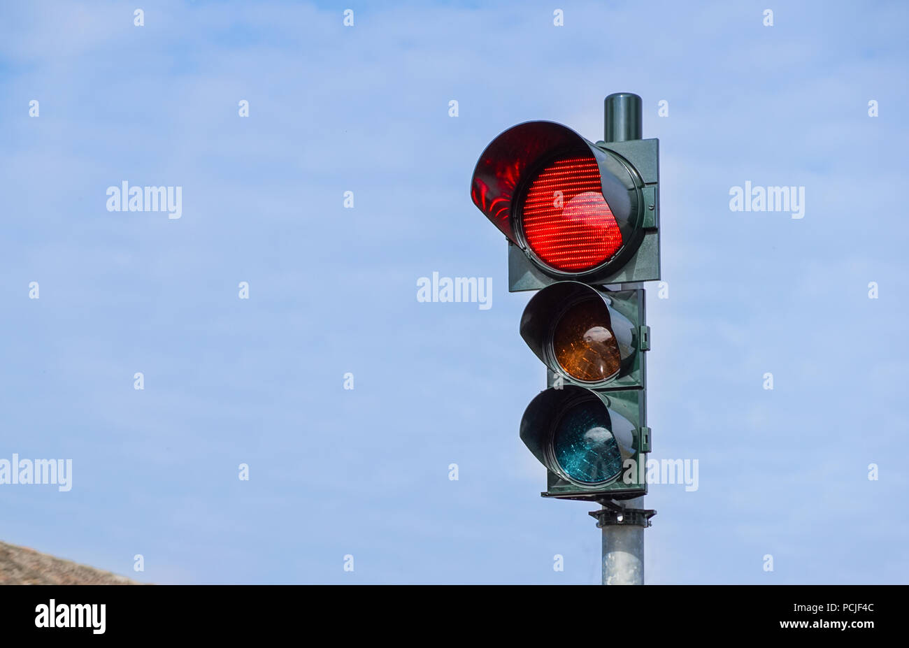 Red traffic light in the city street Stock Photo - Alamy