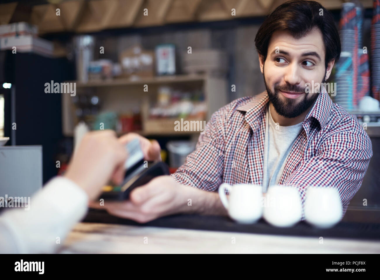 Working in a coffee shop hi-res stock photography and images - Alamy