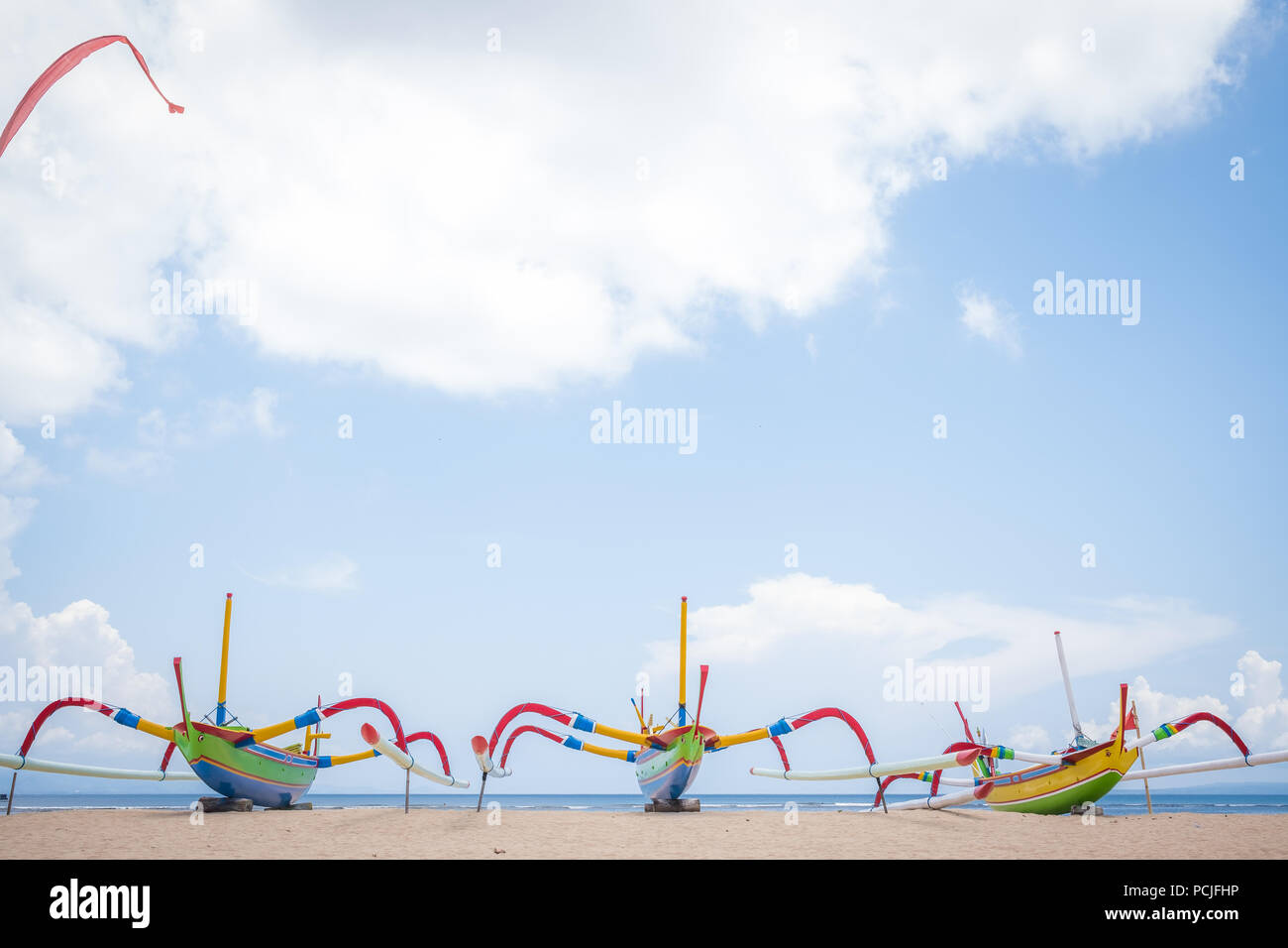 Three traditional jukung boats on beach, Bali, Indonesia Stock Photo ...