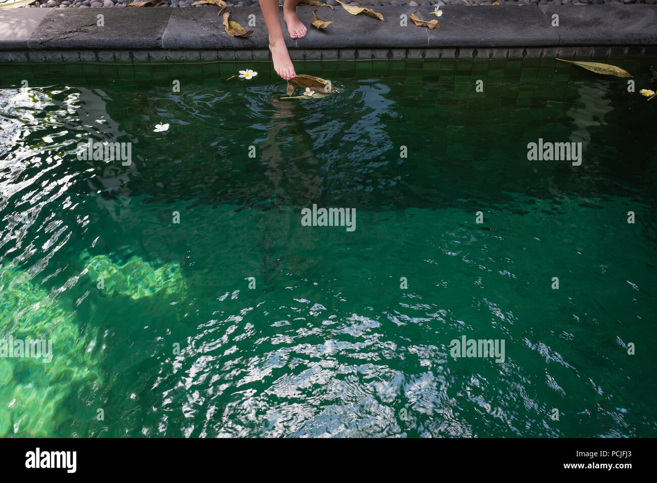 Dipping toe pool hi-res stock photography and images - Alamy