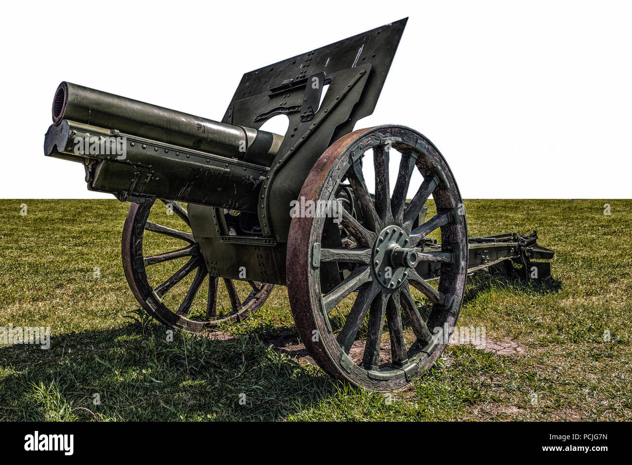 An old artillery cannon stands in the field against a white sky Stock ...