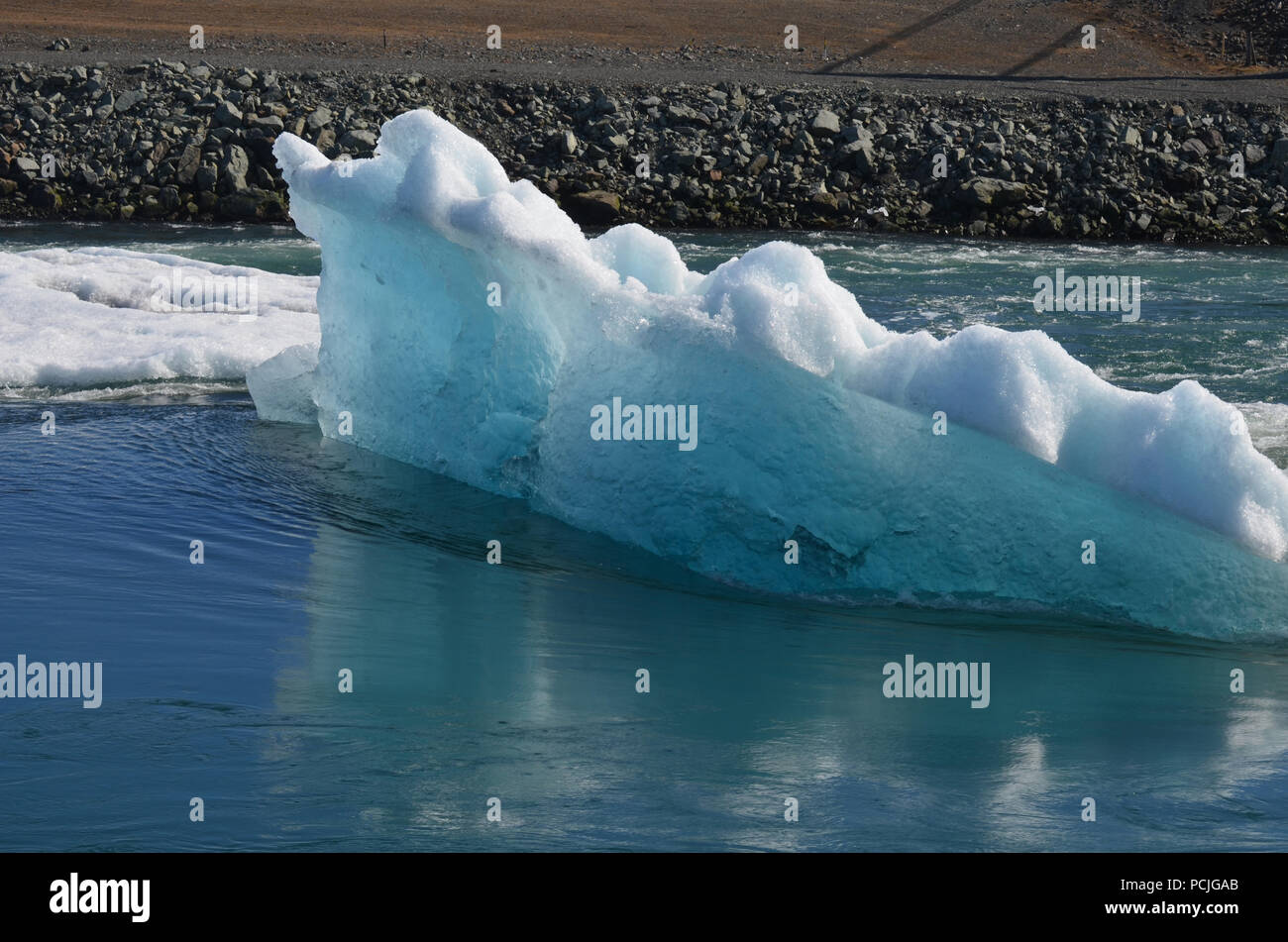 Stunning view of a Iceberg side in a lagoon Stock Photo - Alamy