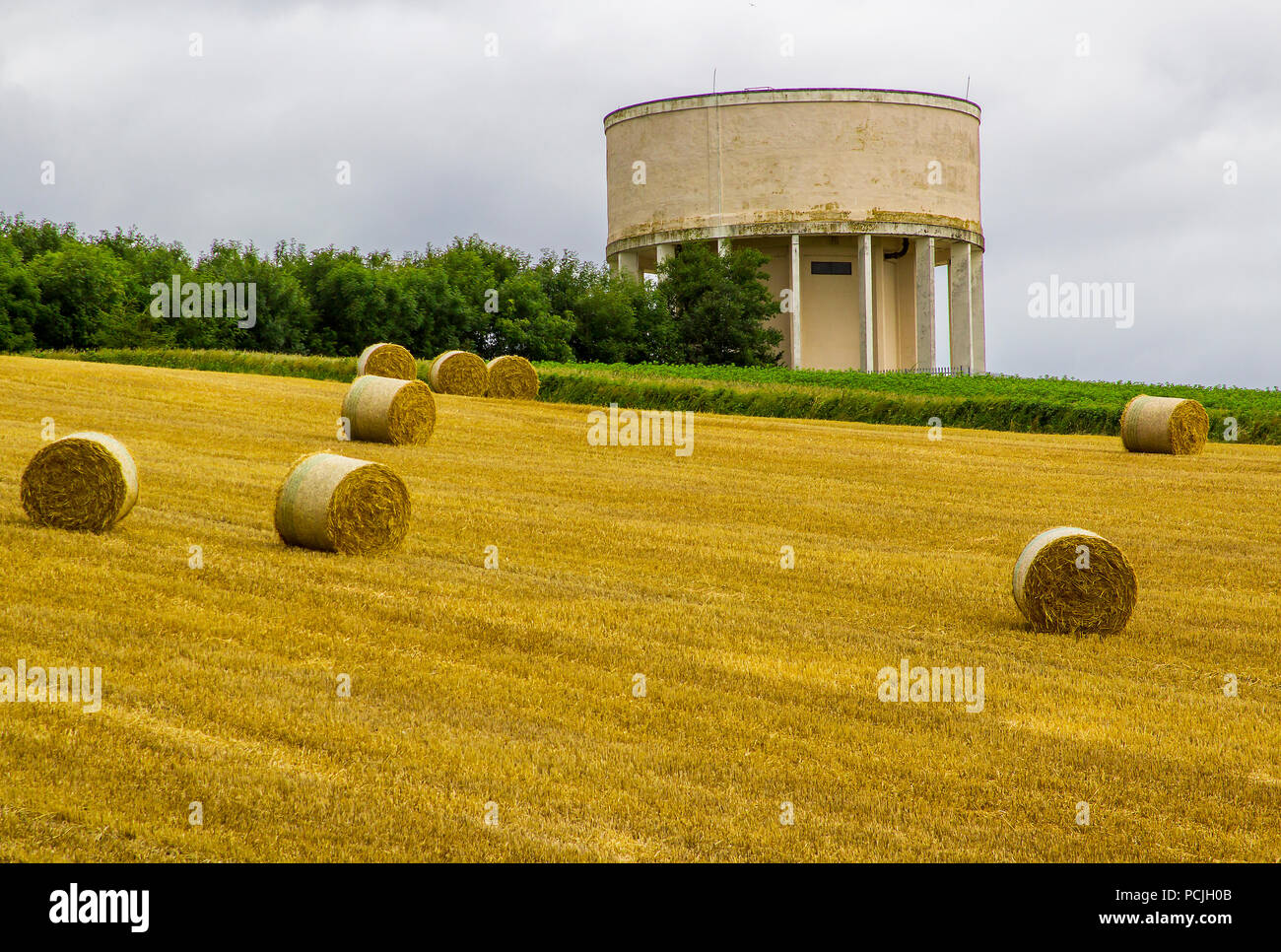 A Concrete Water Supply Tower on top of a small hill at Portavoe near ...