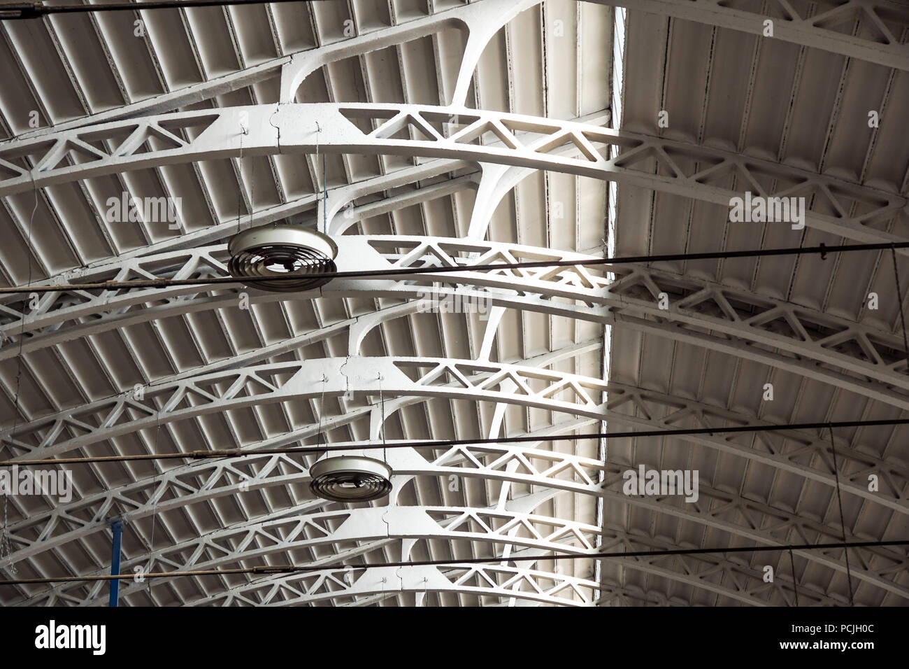 Old arched metal structure. Industrial geometry Stock Photo - Alamy
