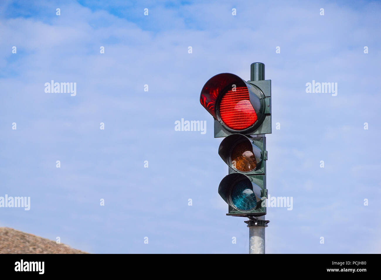 Red traffic light in the city street Stock Photo - Alamy