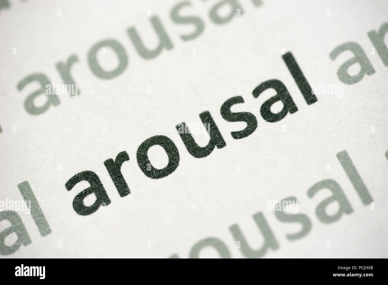word arousal printed on white paper macro Stock Photo - Alamy