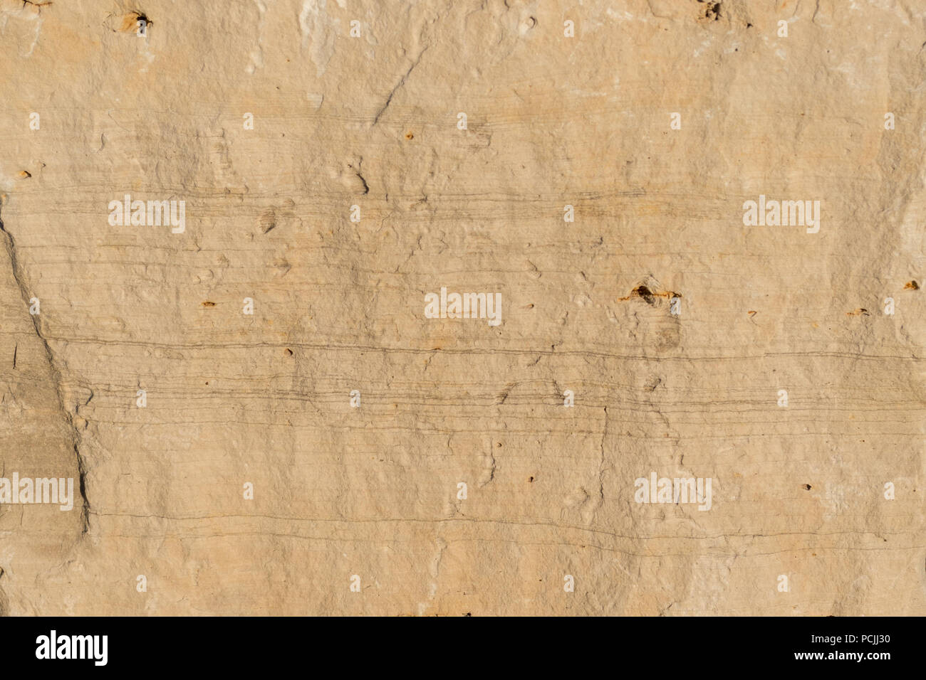 Weathered limestone rock face geology wallpaper background, showing ...