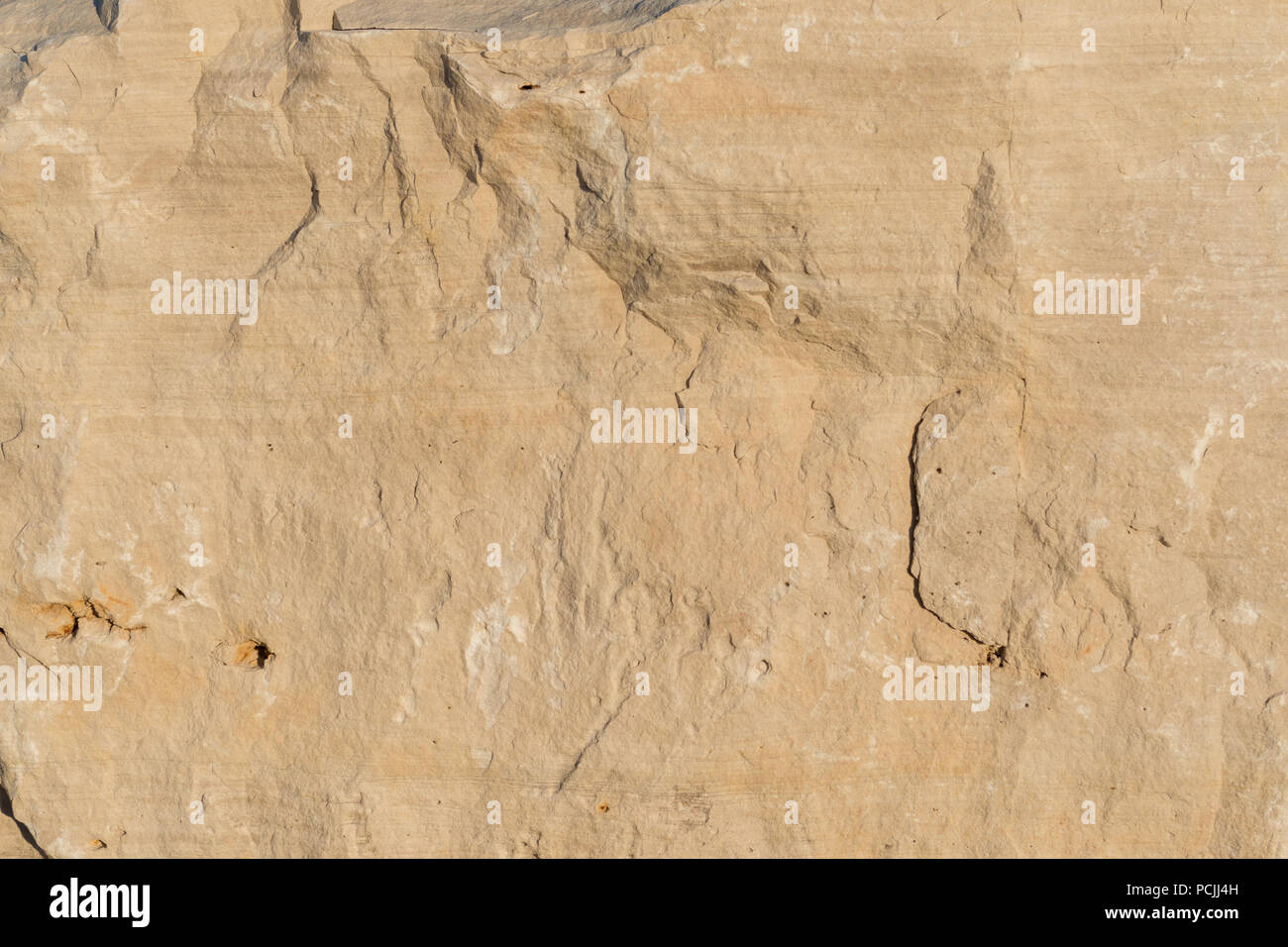 Weathered limestone rock face geology wallpaper background, showing ...
