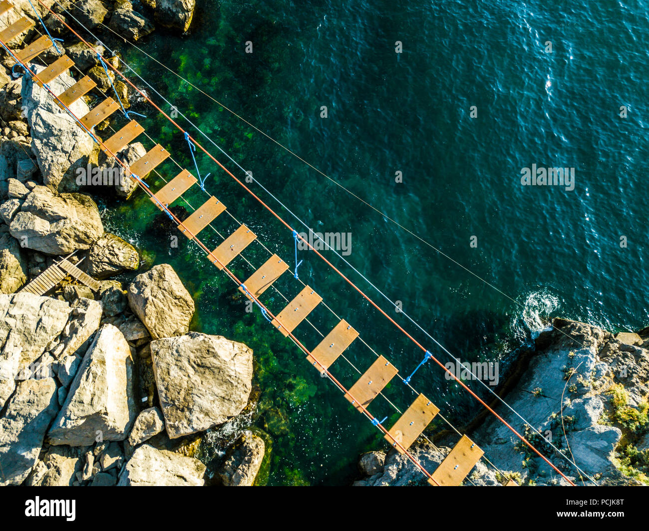 Suspension bridge between rocks hi-res stock photography and images - Alamy