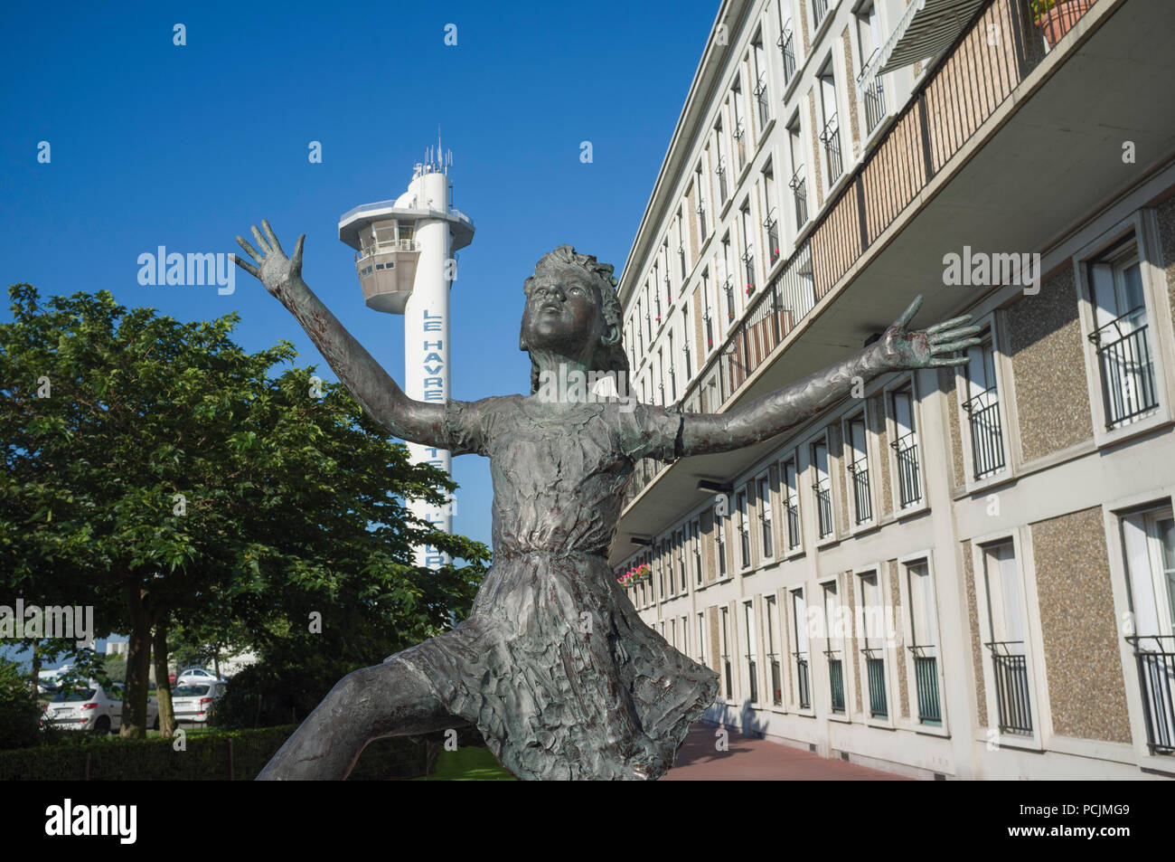 Statue of girl dancer by iconic Auguste Perret apartments in Le Havre ...