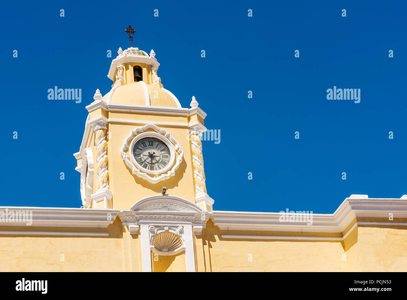 The Arco de Santa Catalina clock tower in Antigua, Guatemala in Central ...