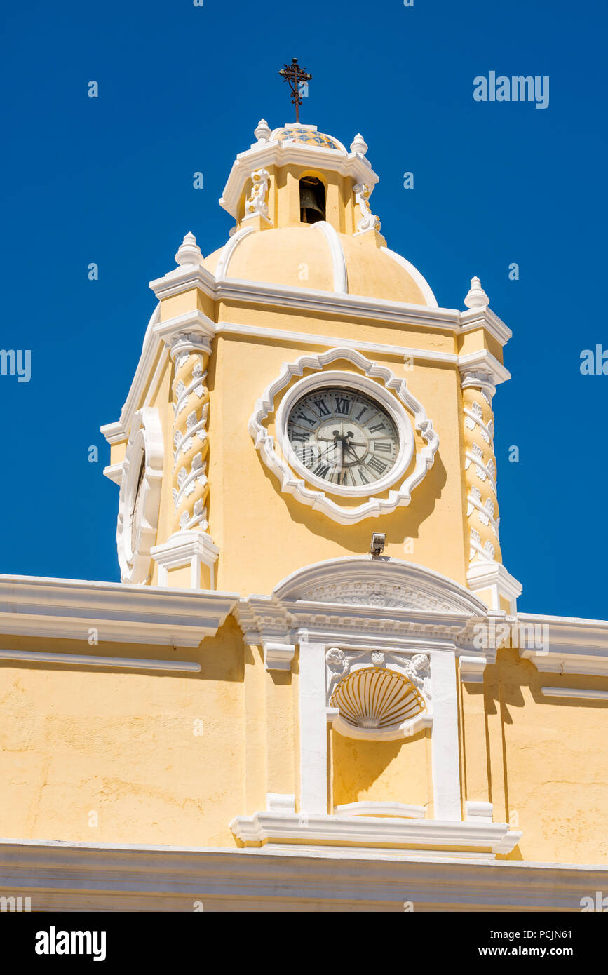 The Arco de Santa Catalina clock tower in Antigua, Guatemala in Central ...