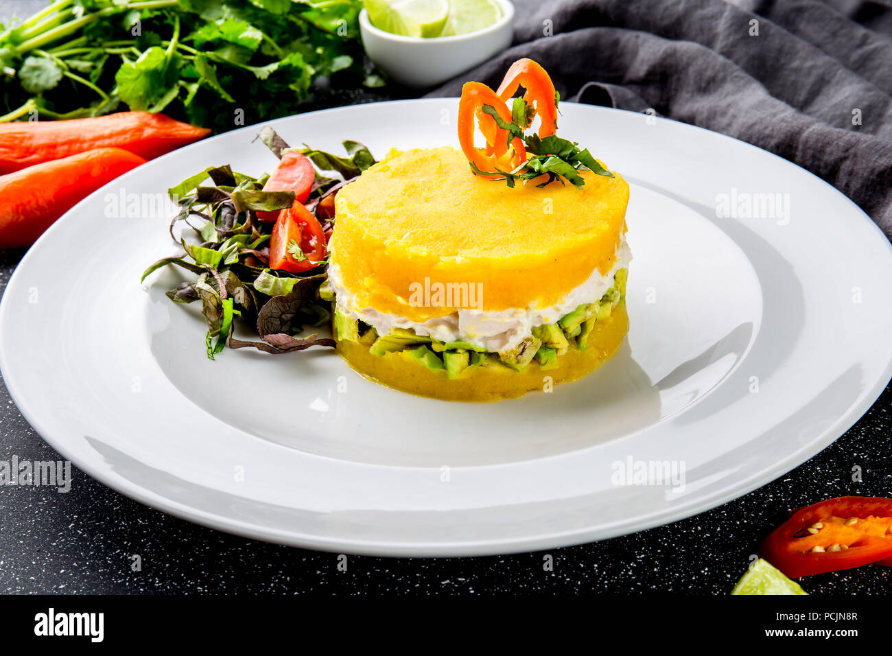 PERUVIAN FOOD. Causa rellena de pollo. Chicken causa rellena. Traditional peruvian dish from ...