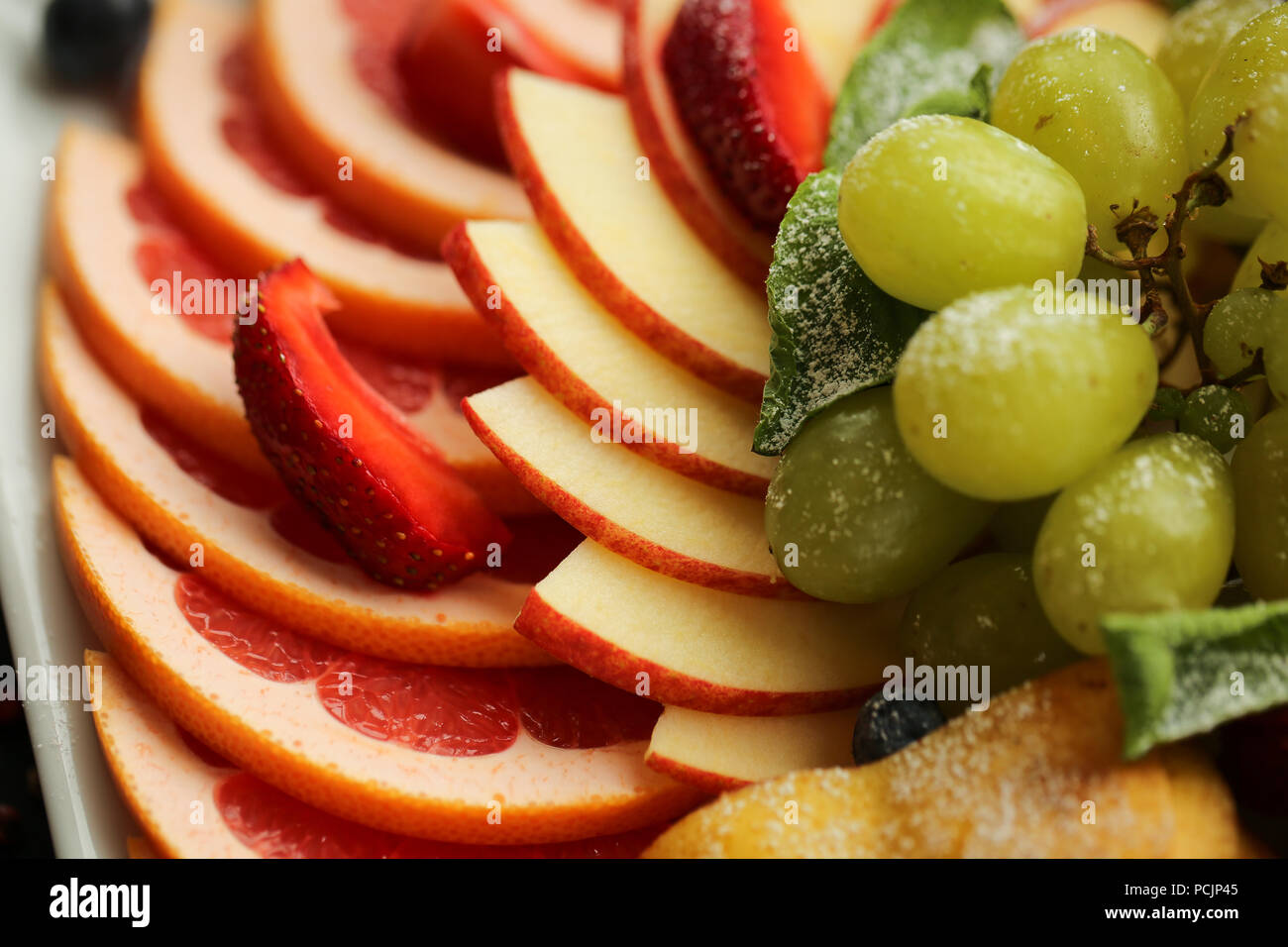 Healthy food. Close up food image of assorted fruits. Macro photography ...