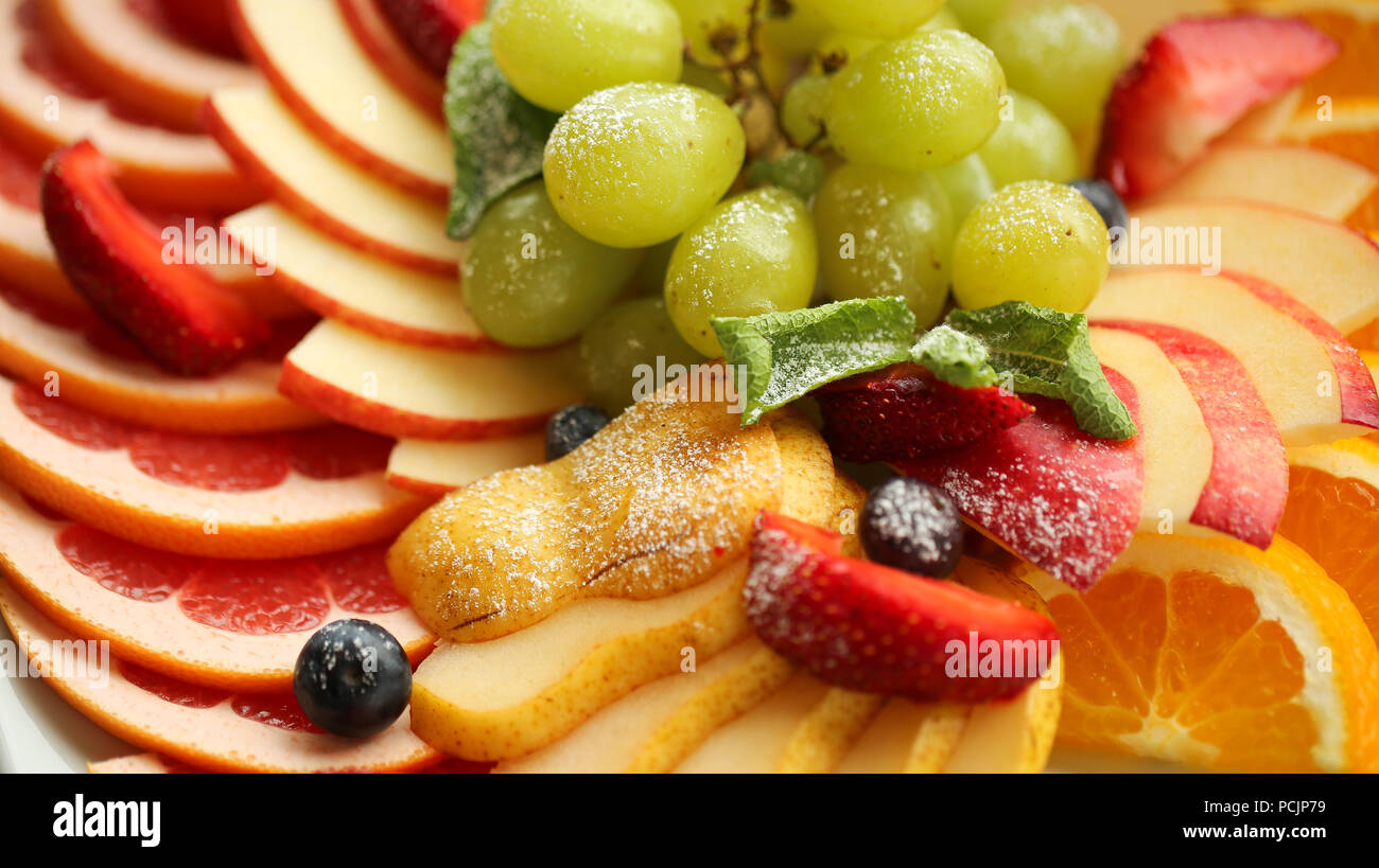 Healthy food. Close up food image of assorted fruits. Macro photography ...