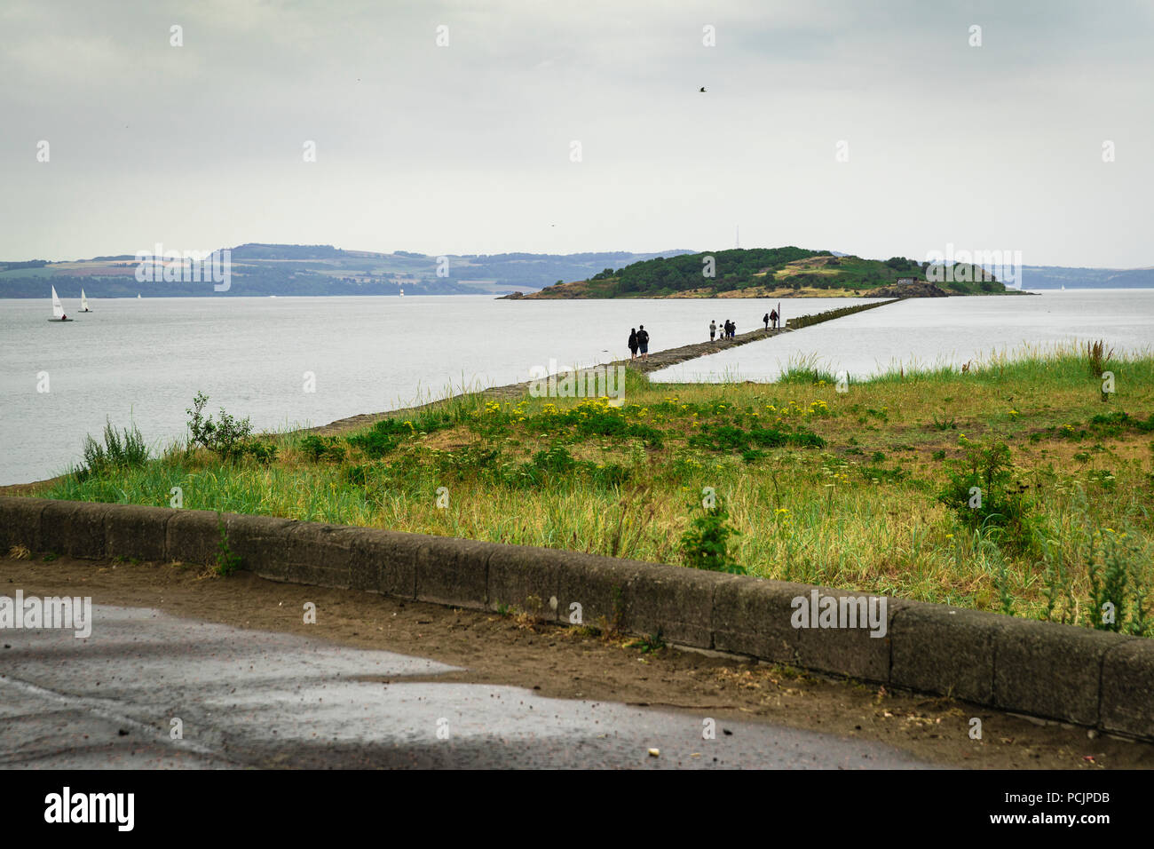 View of Cramond Beach and the causeway leading to Cramond Island on the ...