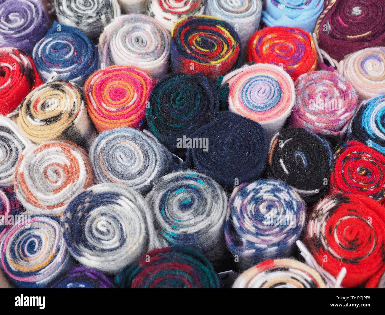 Scottish tartan wool scarves in many different colours Stock Photo - Alamy