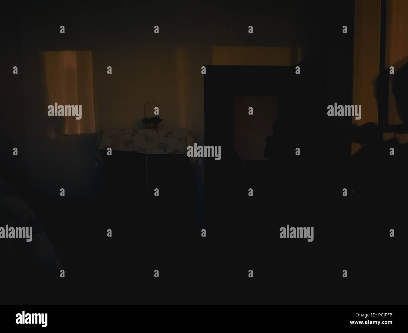 sad dark room interior with shadows at night Stock Photo - Alamy