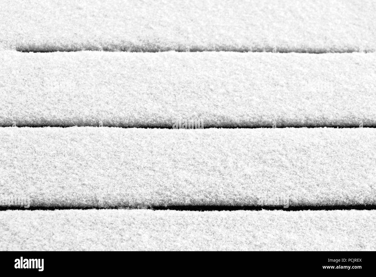 Fresh snow covers the wooden floor of the terrace Stock Photo - Alamy