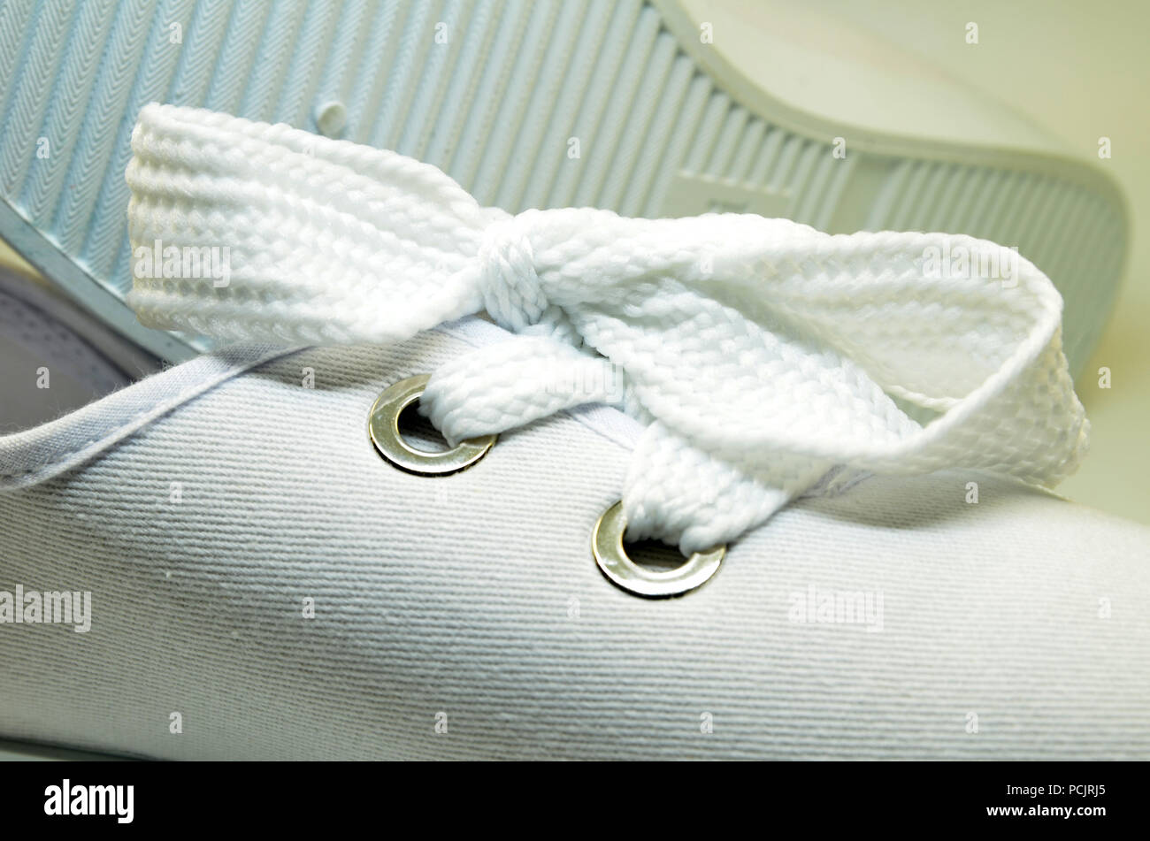 Laces of sports shoes close up background Stock Photo - Alamy