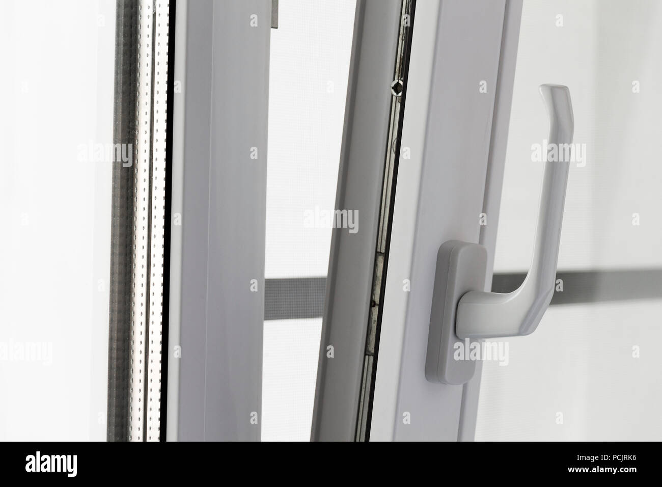 Open a large white plastic window close-up Stock Photo - Alamy