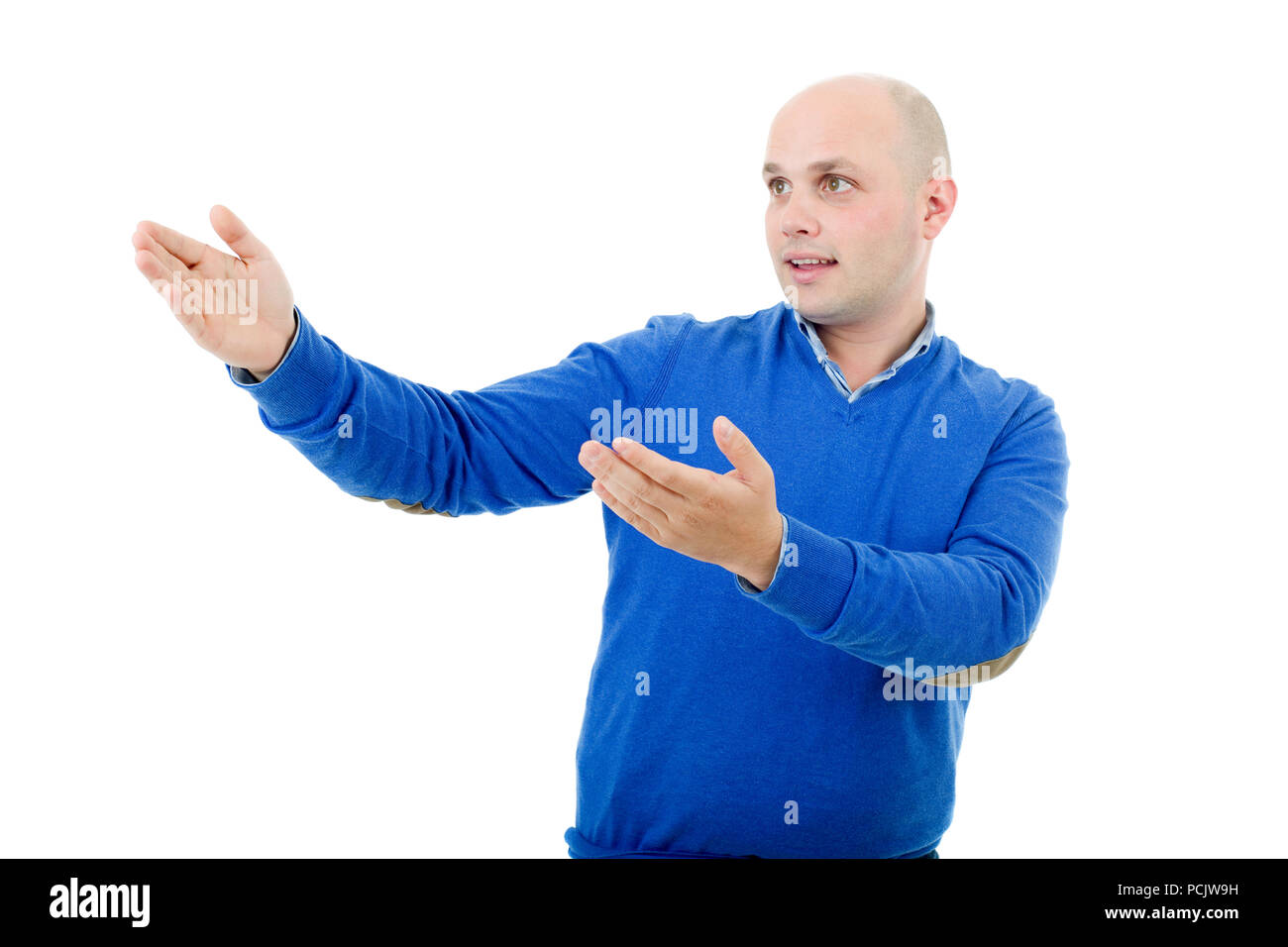 young man pointing to his side, isolated on white background Stock ...