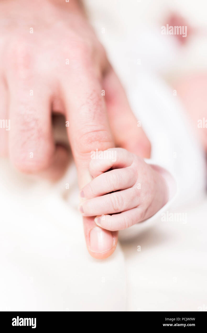 Babyhand hi-res stock photography and images - Alamy