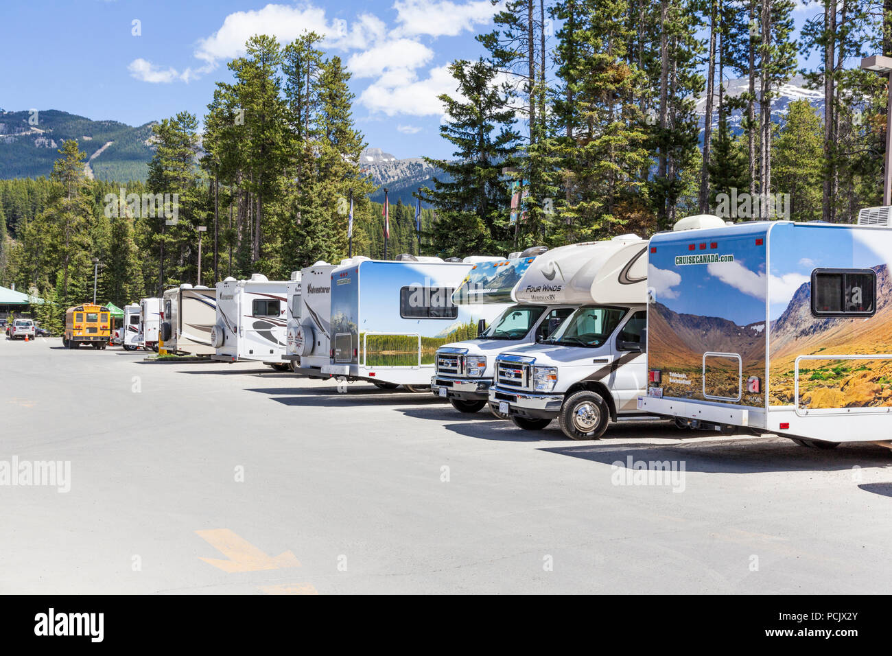 Motor homes in a car park in the Rocky Mountains at the town of Lake ...