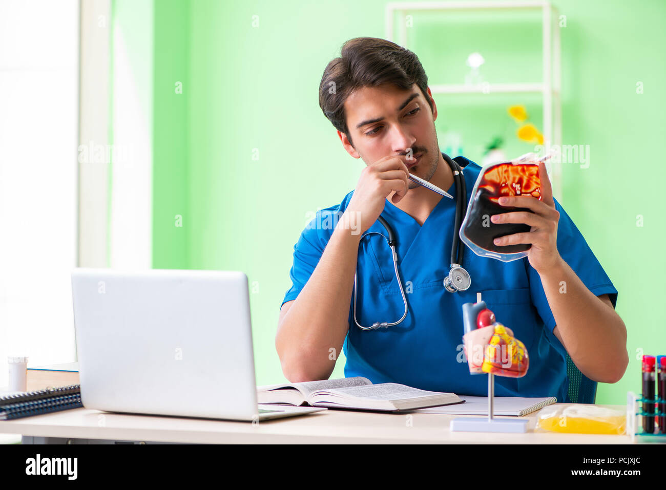 Doctor doing blood analysis in the lab Stock Photo - Alamy
