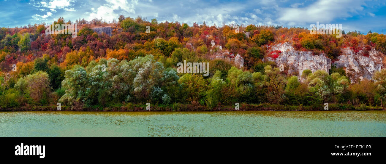 Colours of autumn on the edge of the river Stock Photo - Alamy
