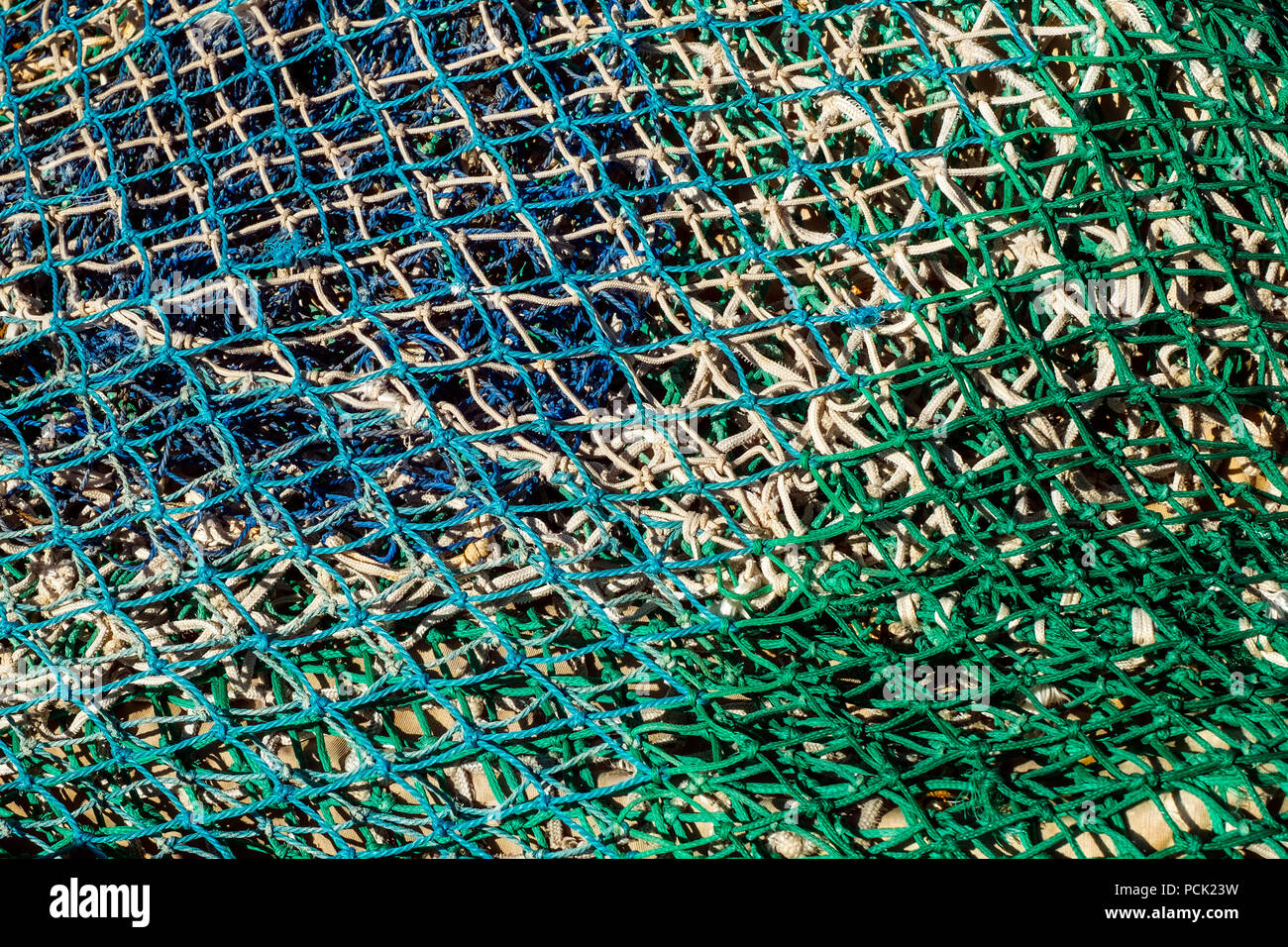 Fishing net background Stock Photo - Alamy