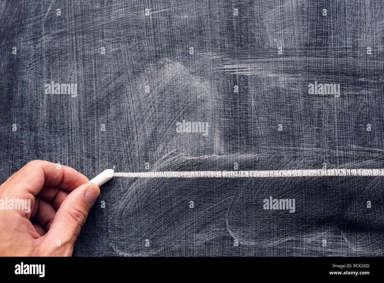 School class holding up hand hi-res stock photography and images - Alamy