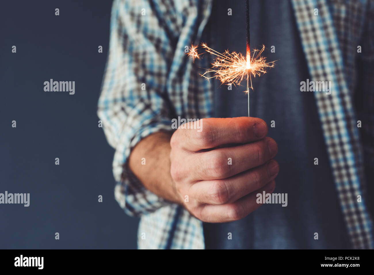Man holding stick hi-res stock photography and images - Alamy