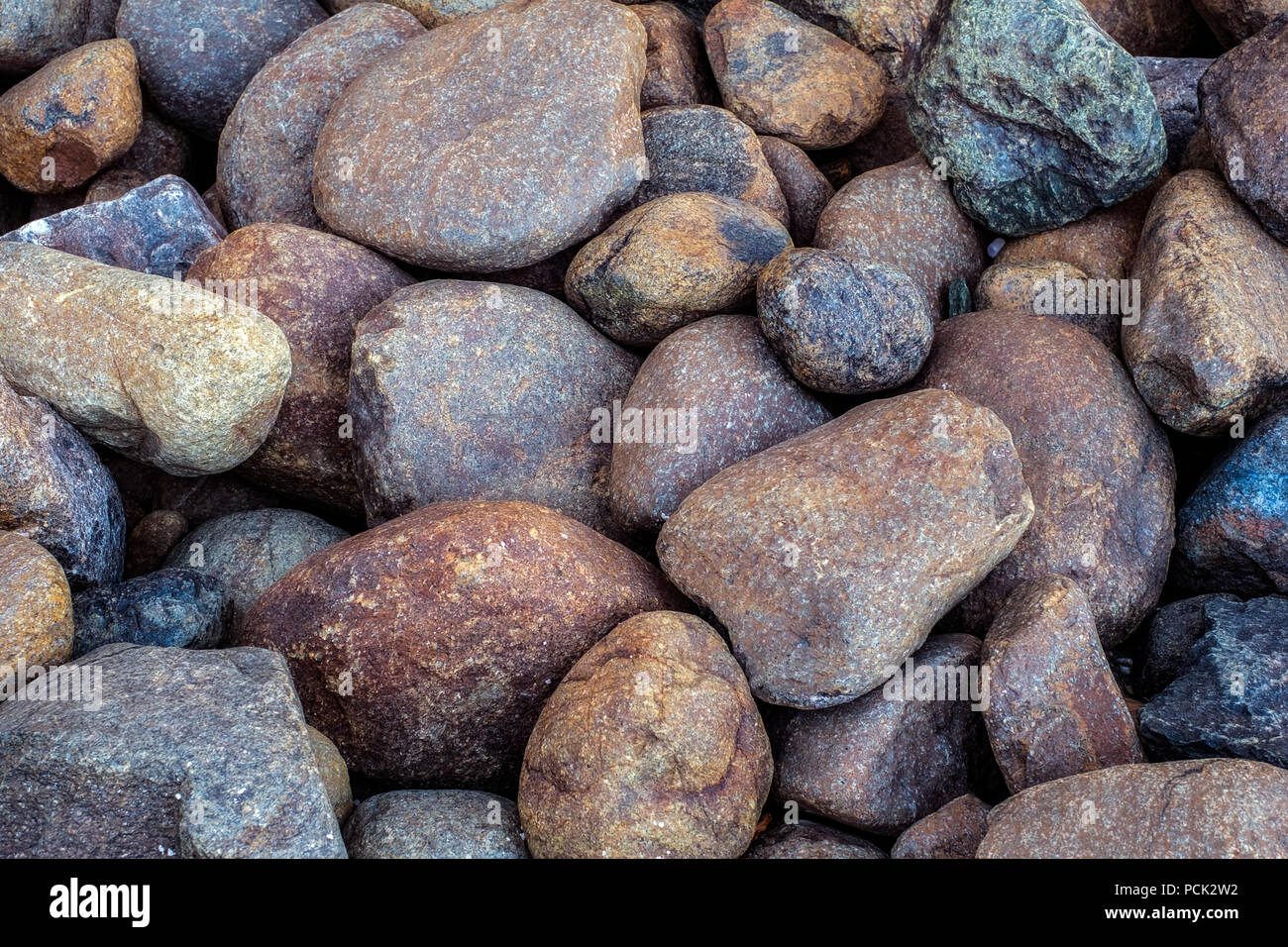 Rock and hard place pebbles stones stone white background hi-res stock ...