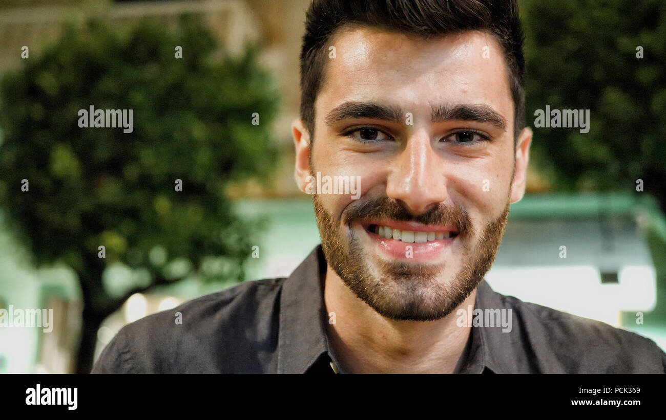 Young man outside at night Stock Photo - Alamy