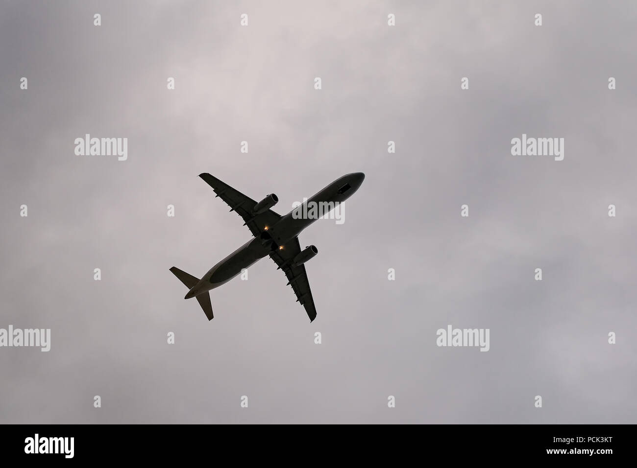 Airplane on sky Stock Photo - Alamy