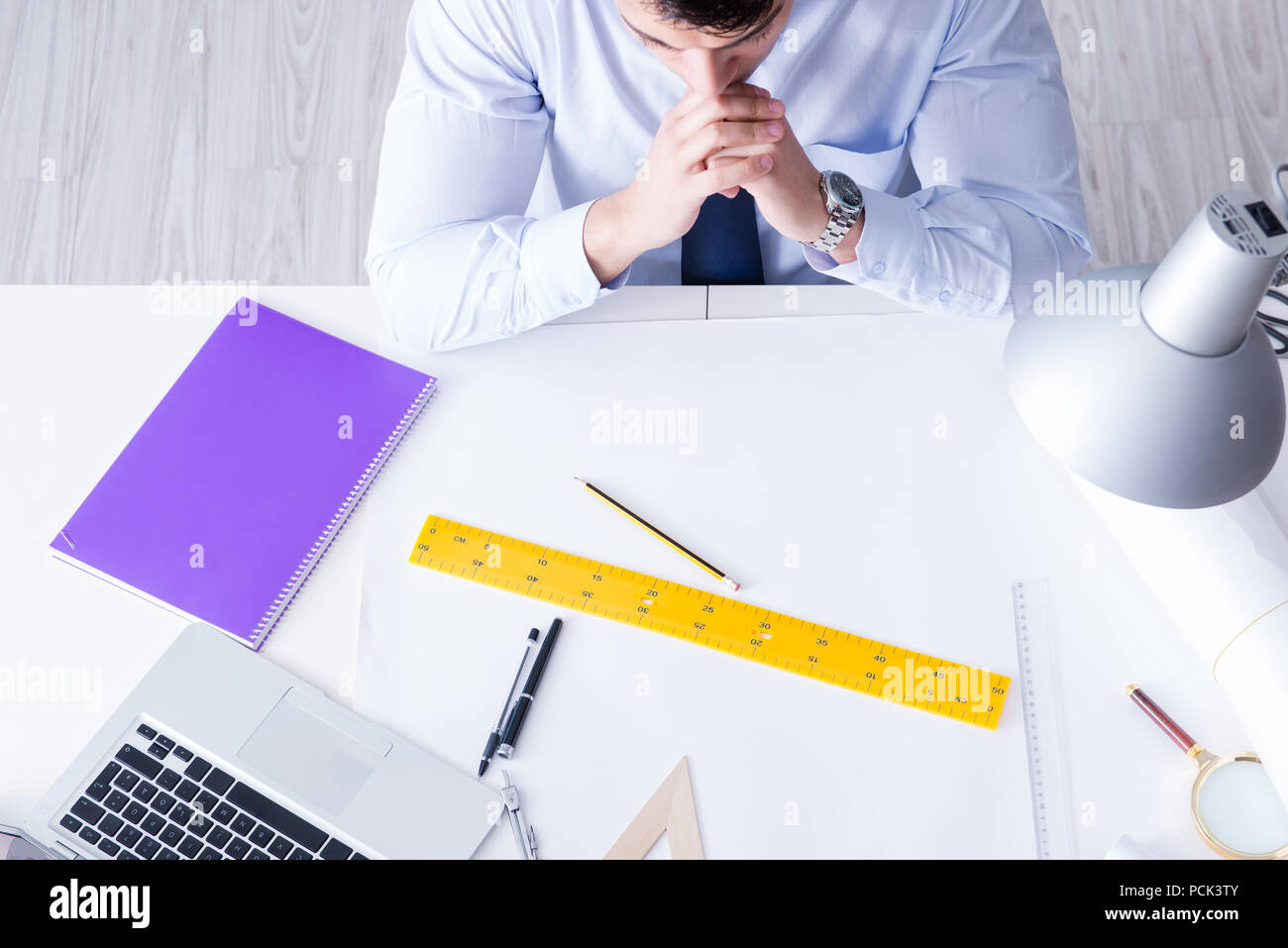 Engineer studying paper drawings on hi-res stock photography and images ...