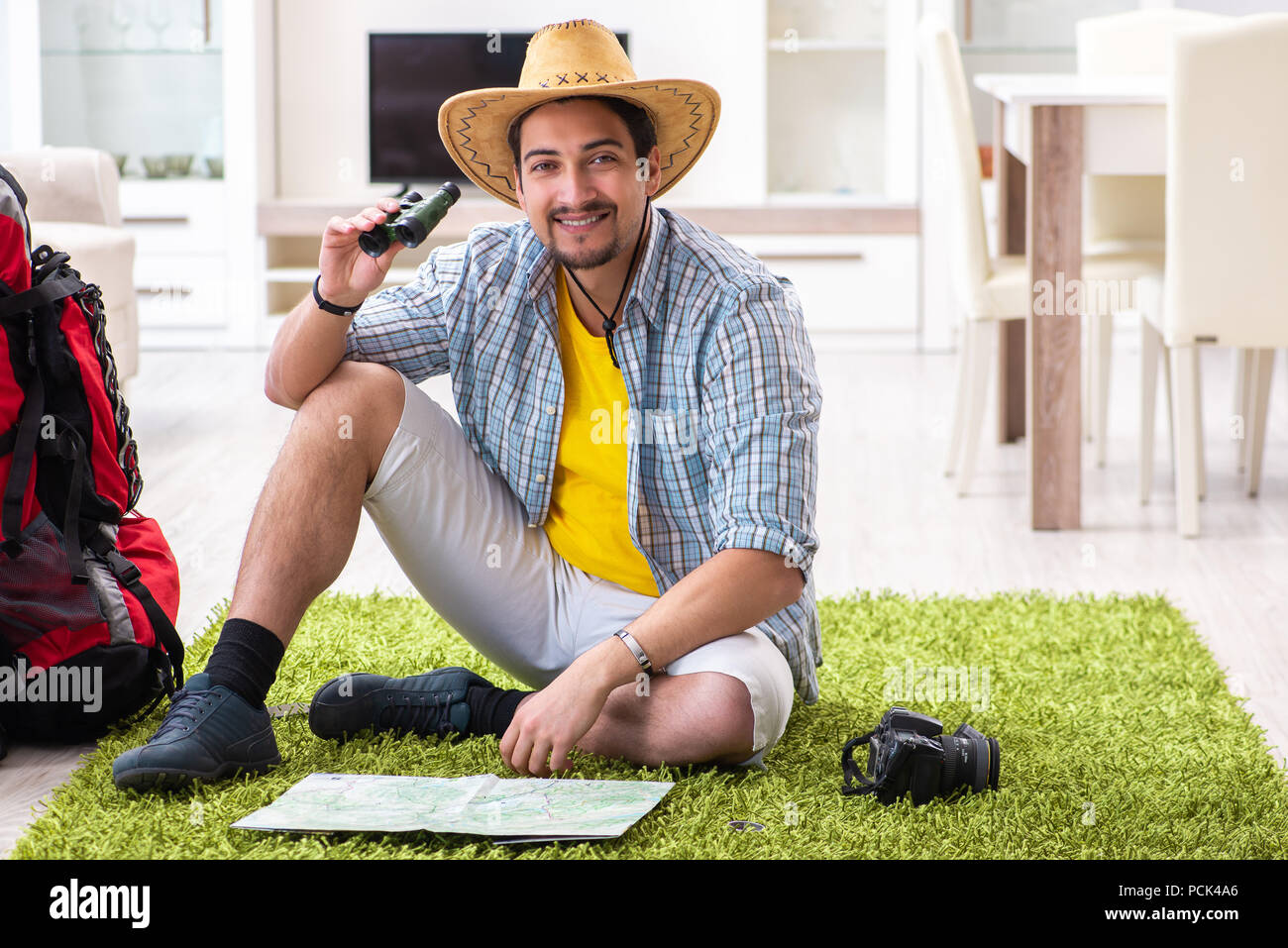 Man planning his travel with map Stock Photo - Alamy