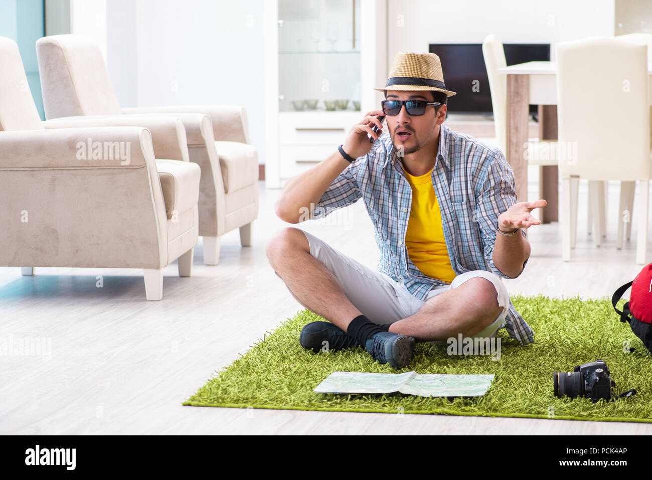 Man planning his travel with map Stock Photo - Alamy