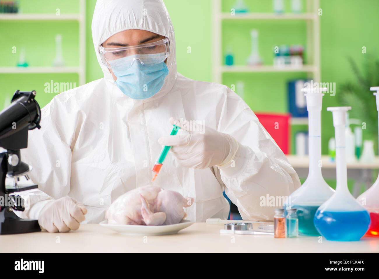 Lab assistant testing GMO chicken Stock Photo - Alamy