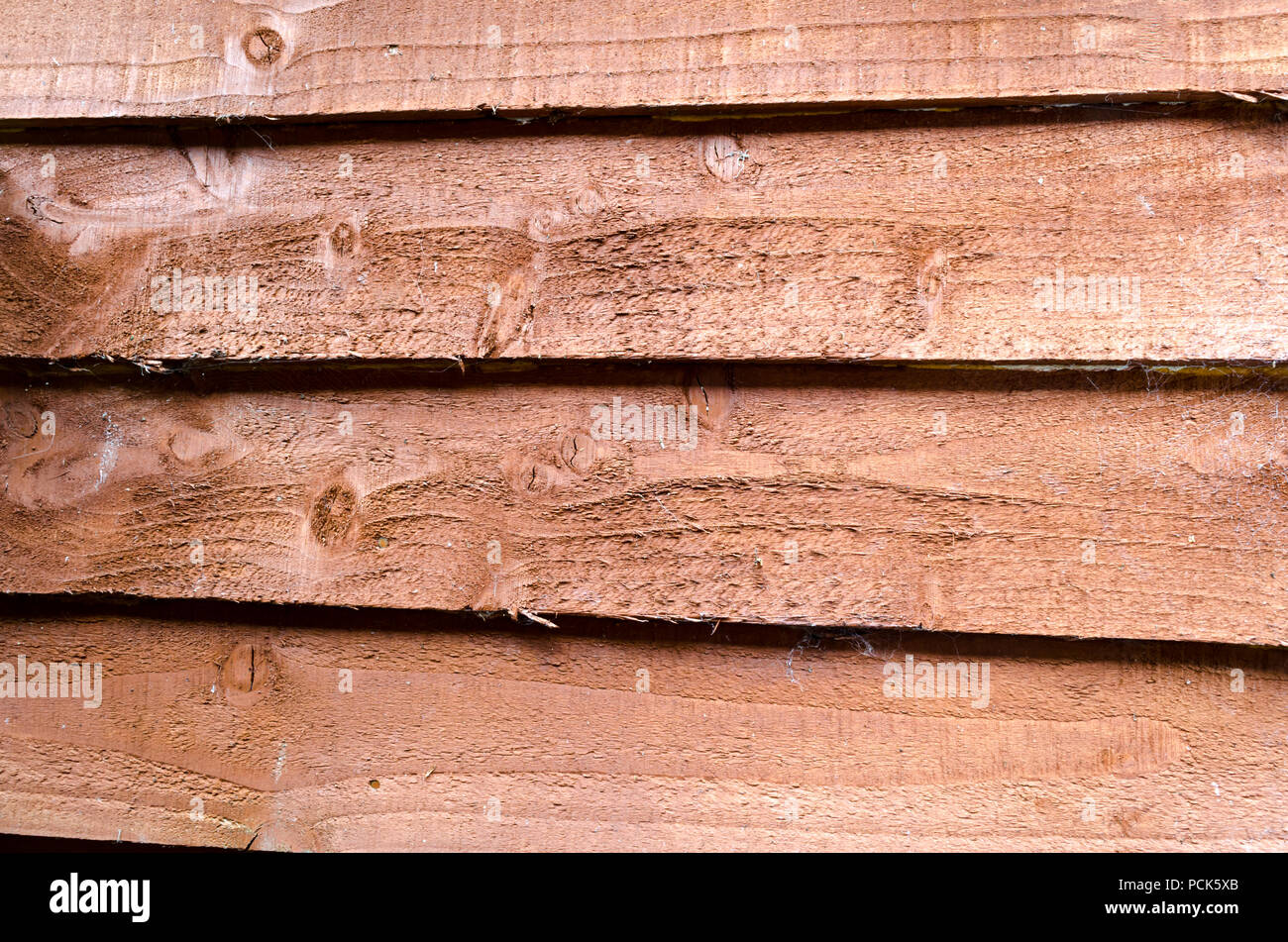 A Background of Brown Overlap Timber Stock Photo - Alamy