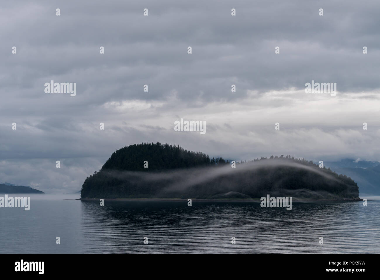 Cloudy island hi-res stock photography and images - Alamy