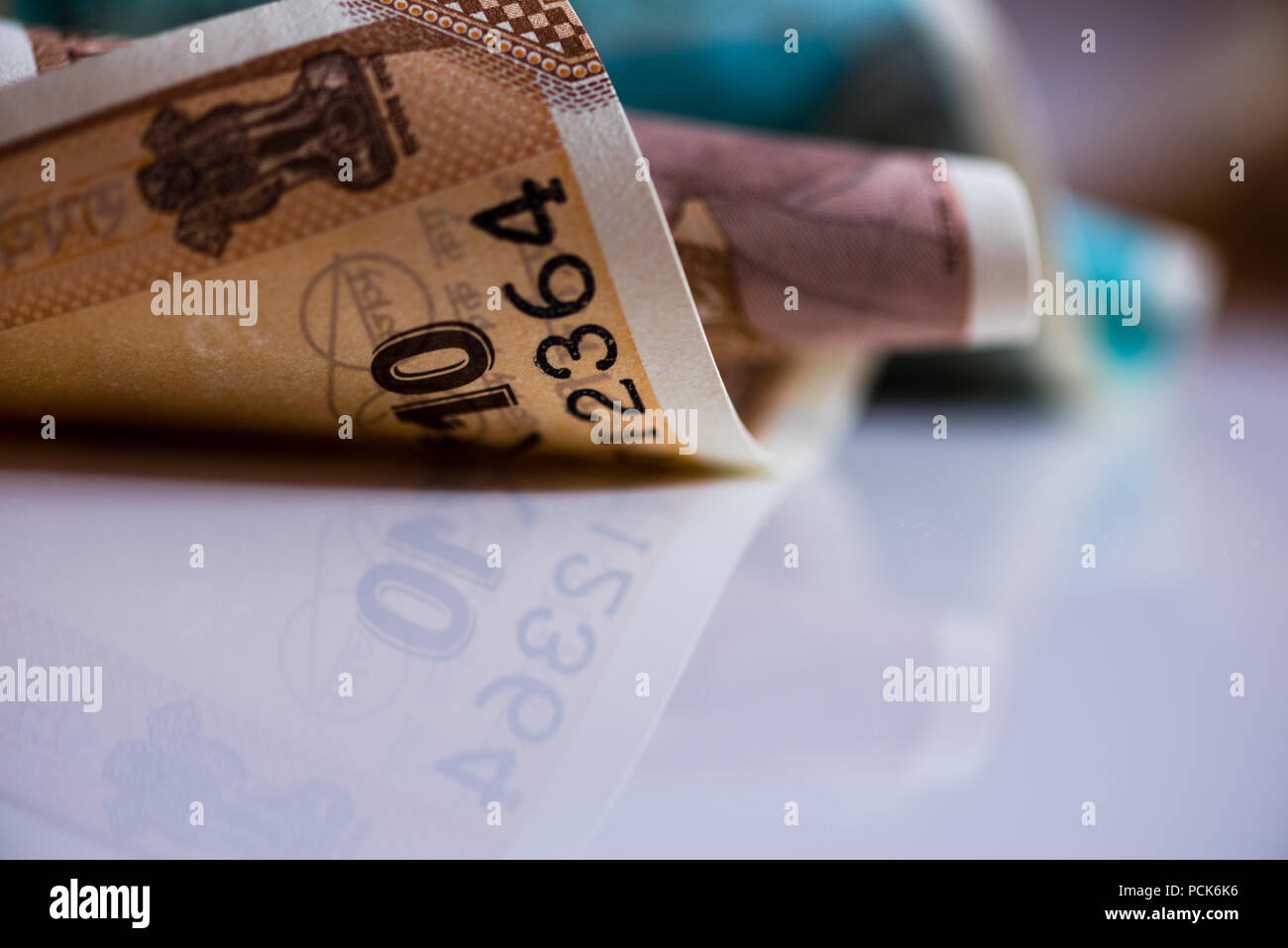 Indian currency notes of Rupees Ten isolated background Stock Photo - Alamy